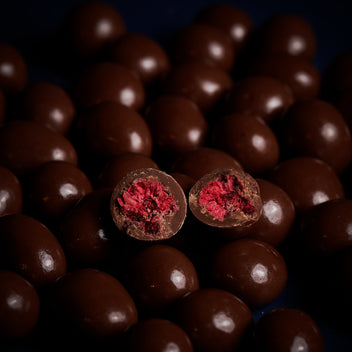 Milk Chocolate & Raspberry Pearls 100g – Godiva Australia
